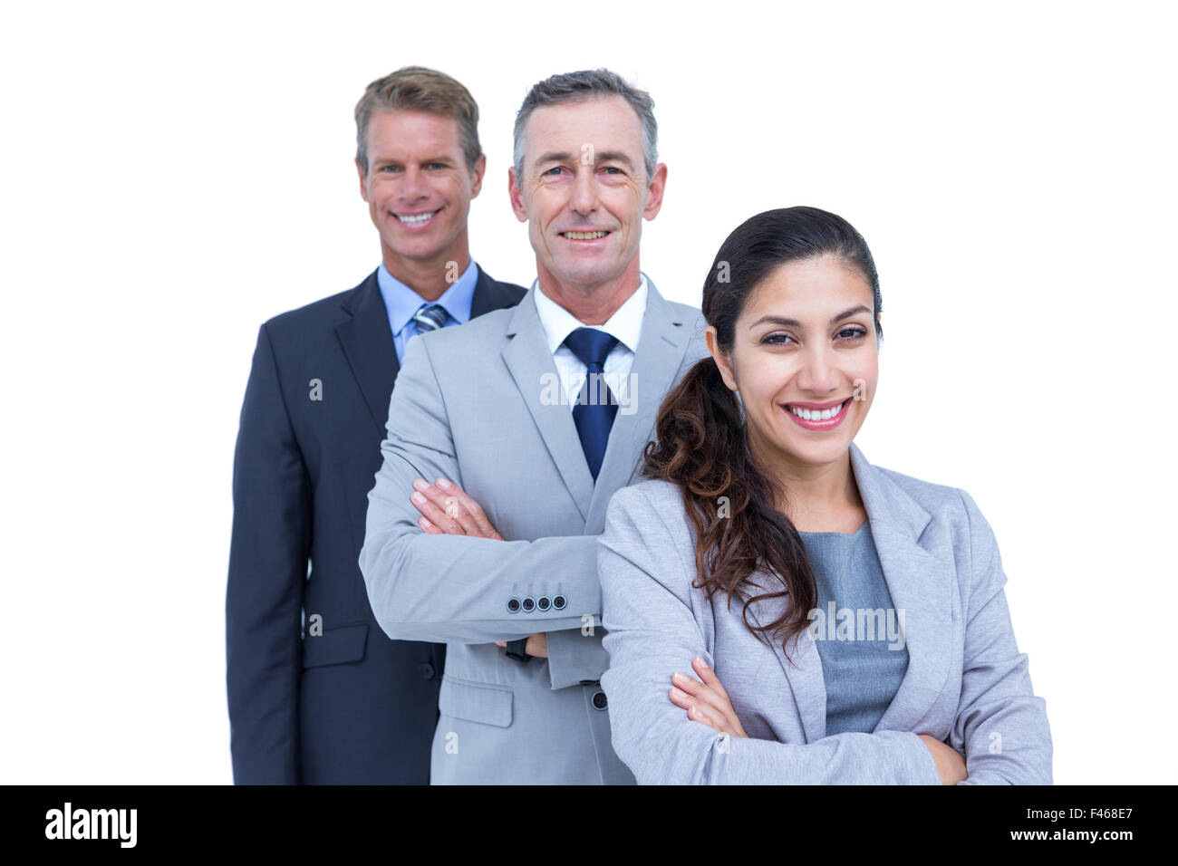 Happy business team standing in a line Stock Photo - Alamy