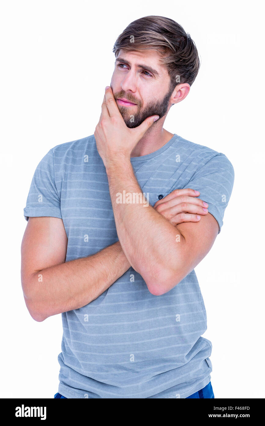 Handsome man thinking with hand on chin Stock Photo - Alamy