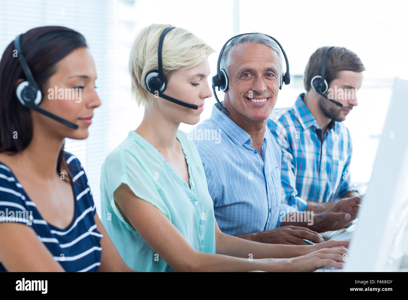 Mature male call centre hi-res stock photography and images - Alamy