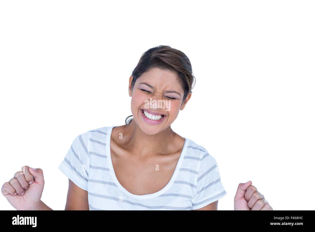 A pretty brunette woman cheering Stock Photo - Alamy