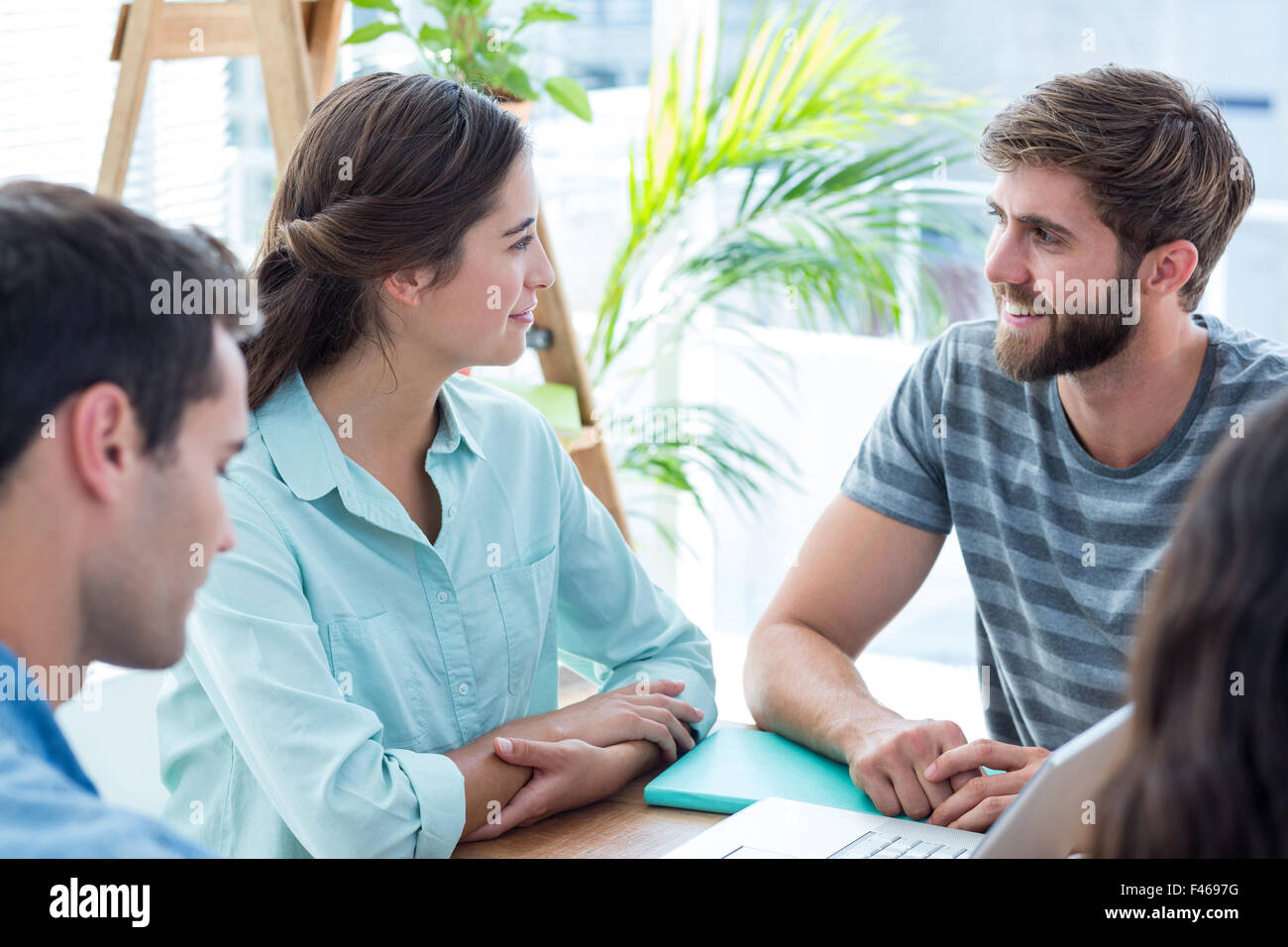 Creative business people in discussion Stock Photo - Alamy