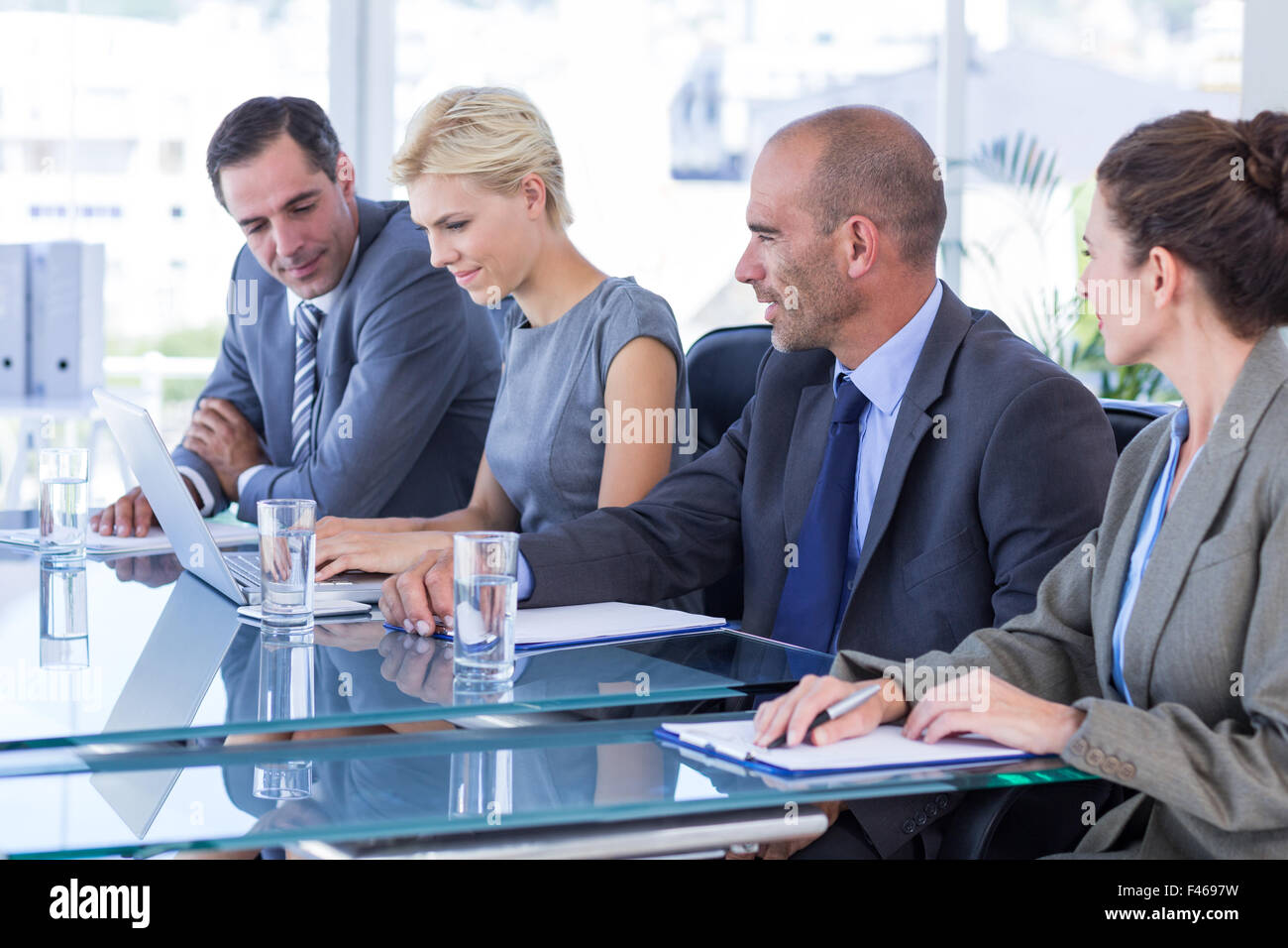 Business team having a meeting Stock Photo - Alamy