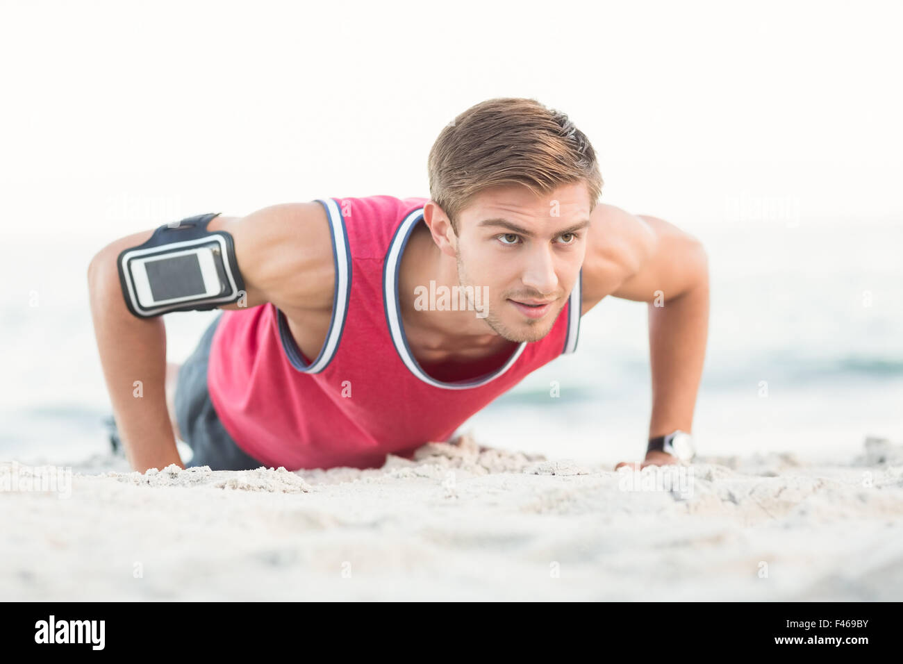 Handsome man doing push ups Stock Photo - Alamy