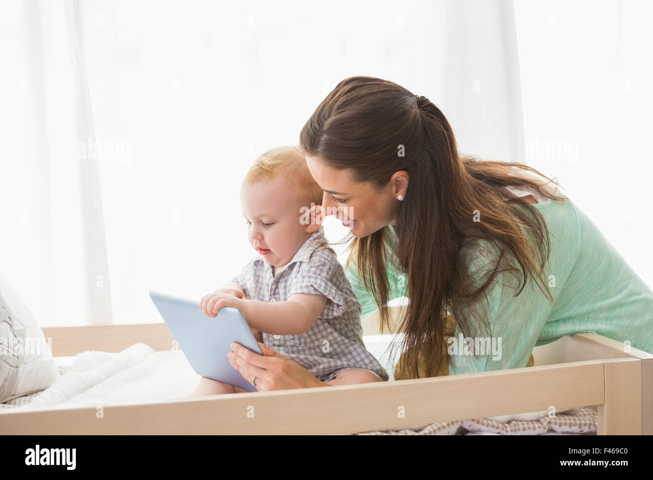 Woman baby boy using hi-res stock photography and images - Alamy