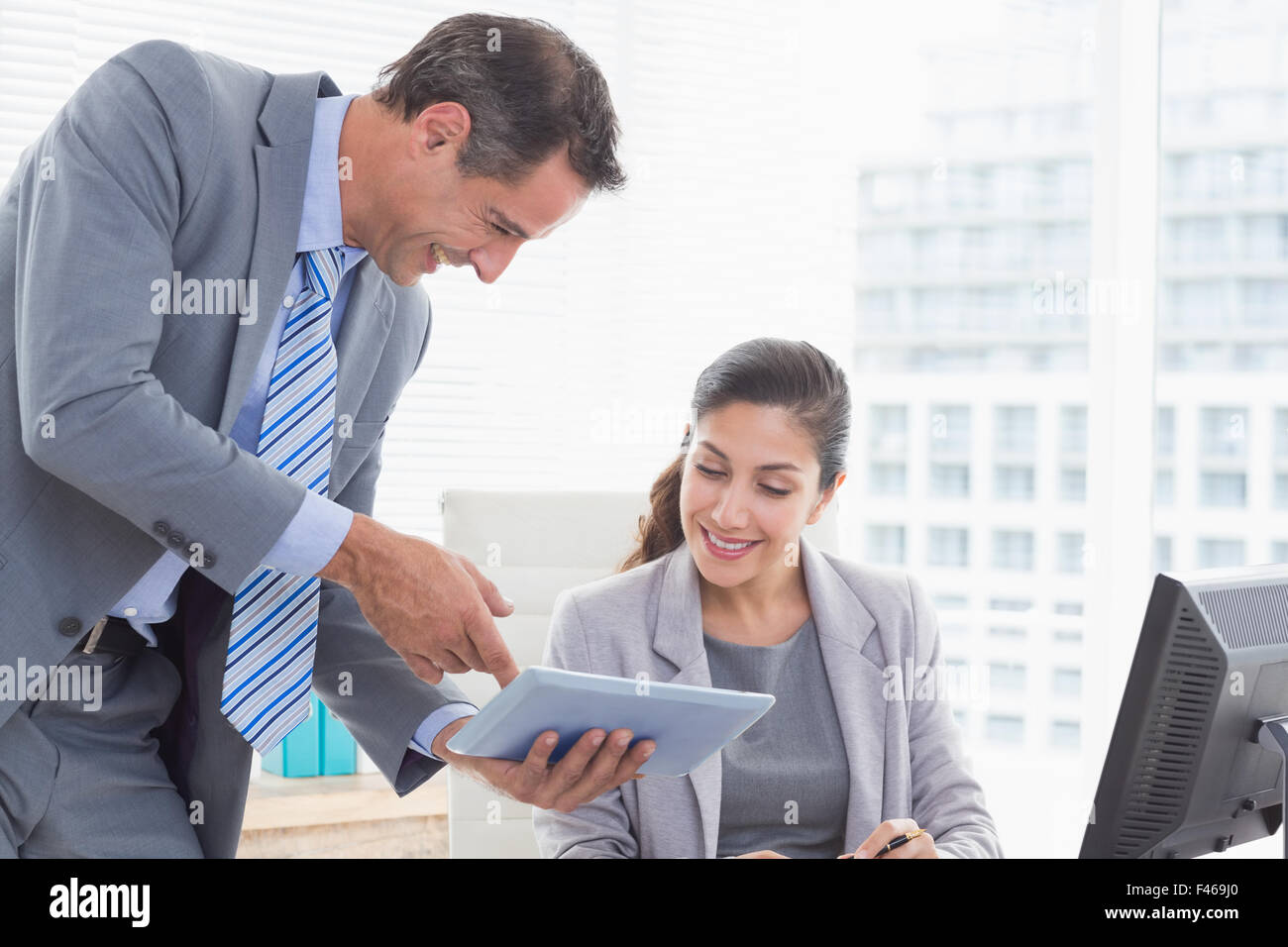 Business partners working together Stock Photo - Alamy