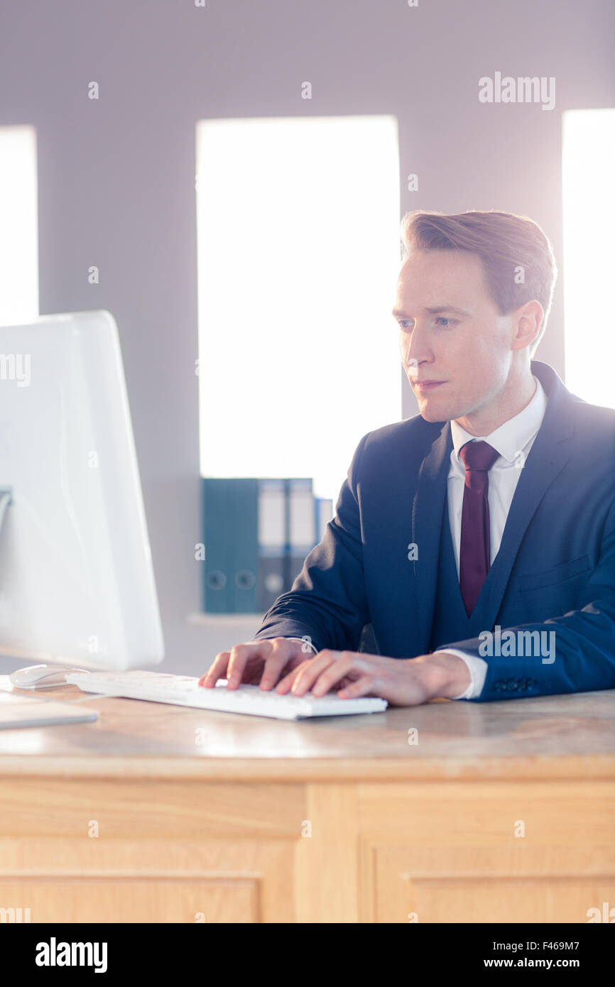 Serious typing hi-res stock photography and images - Alamy