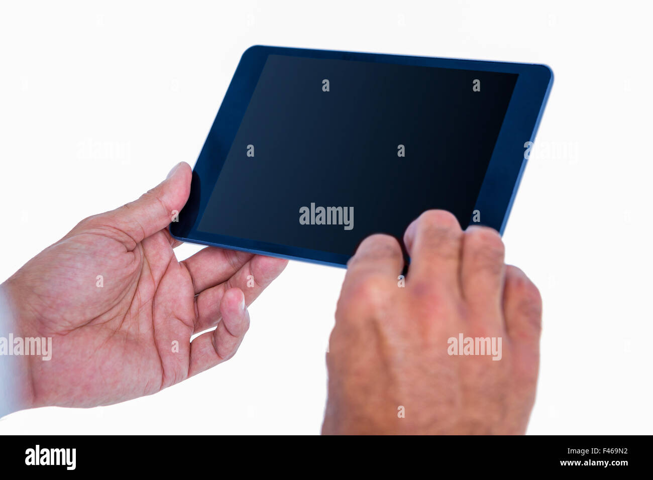 Hand of man touching tablet computer Stock Photo - Alamy