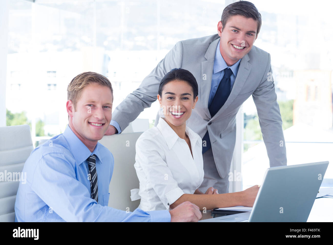 Business people using laptop Stock Photo - Alamy