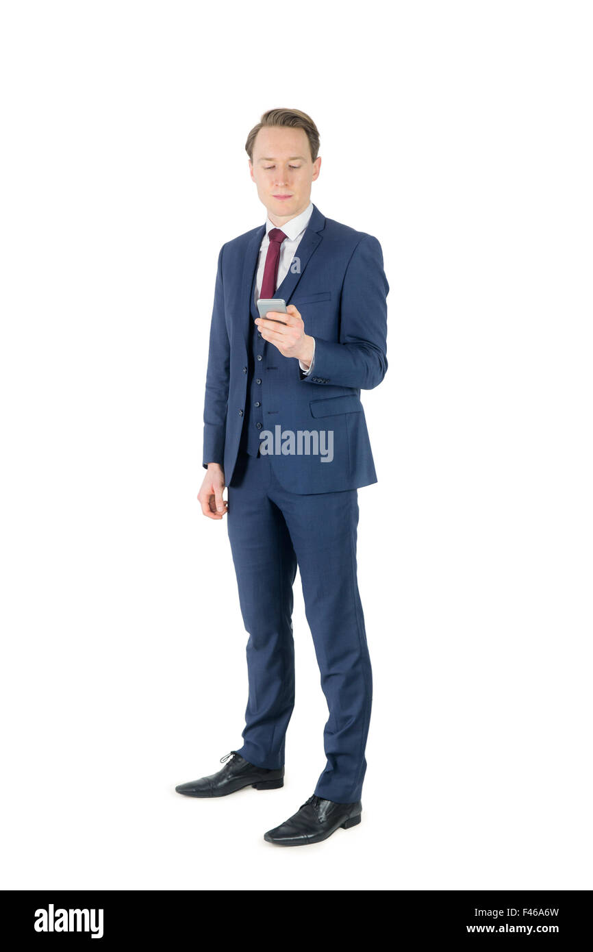 Businessman looking smartphone Cut Out Stock Images & Pictures - Alamy