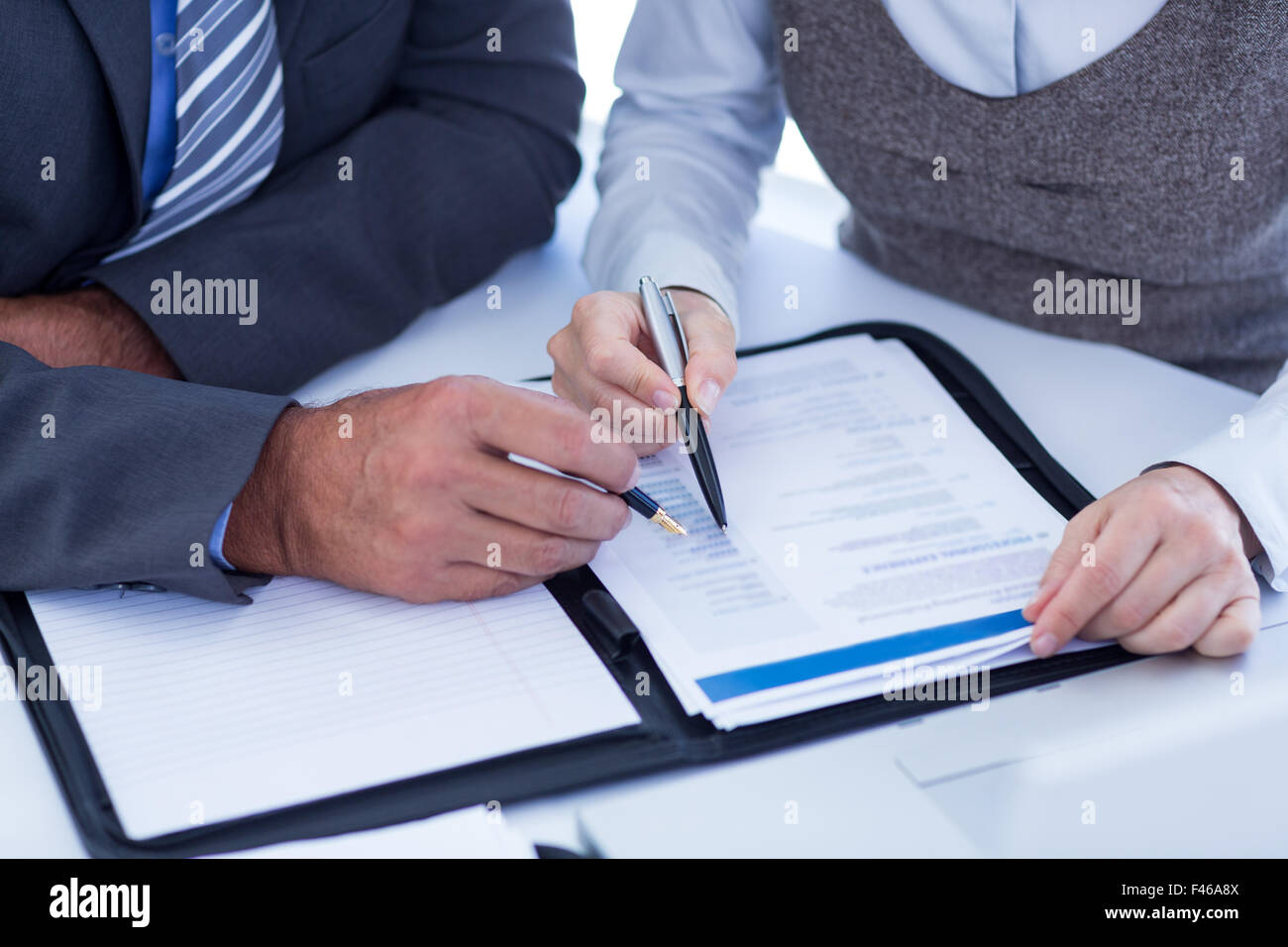 Staff checking documents hi-res stock photography and images - Alamy