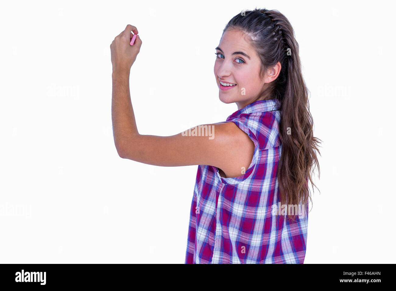 Happy pretty brunette writing Stock Photo - Alamy