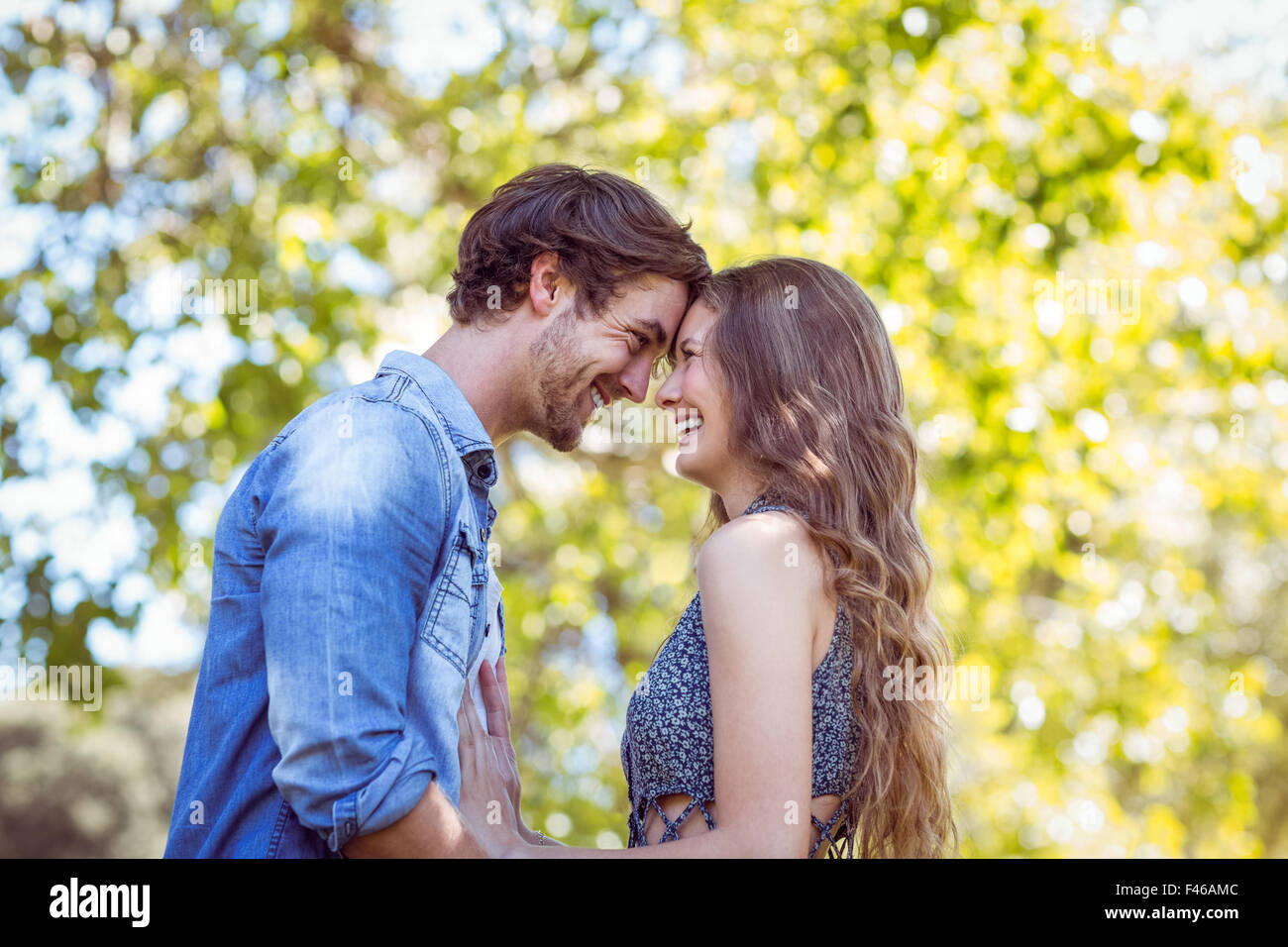 Cute couple in the park Stock Photo - Alamy