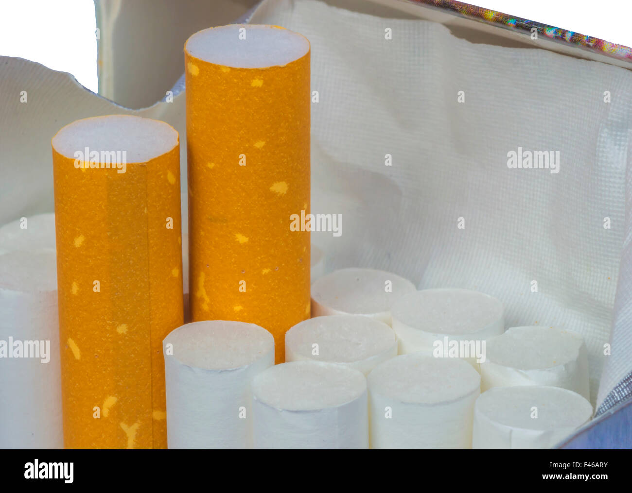 Yellow filter cigarette macro Stock Photo - Alamy