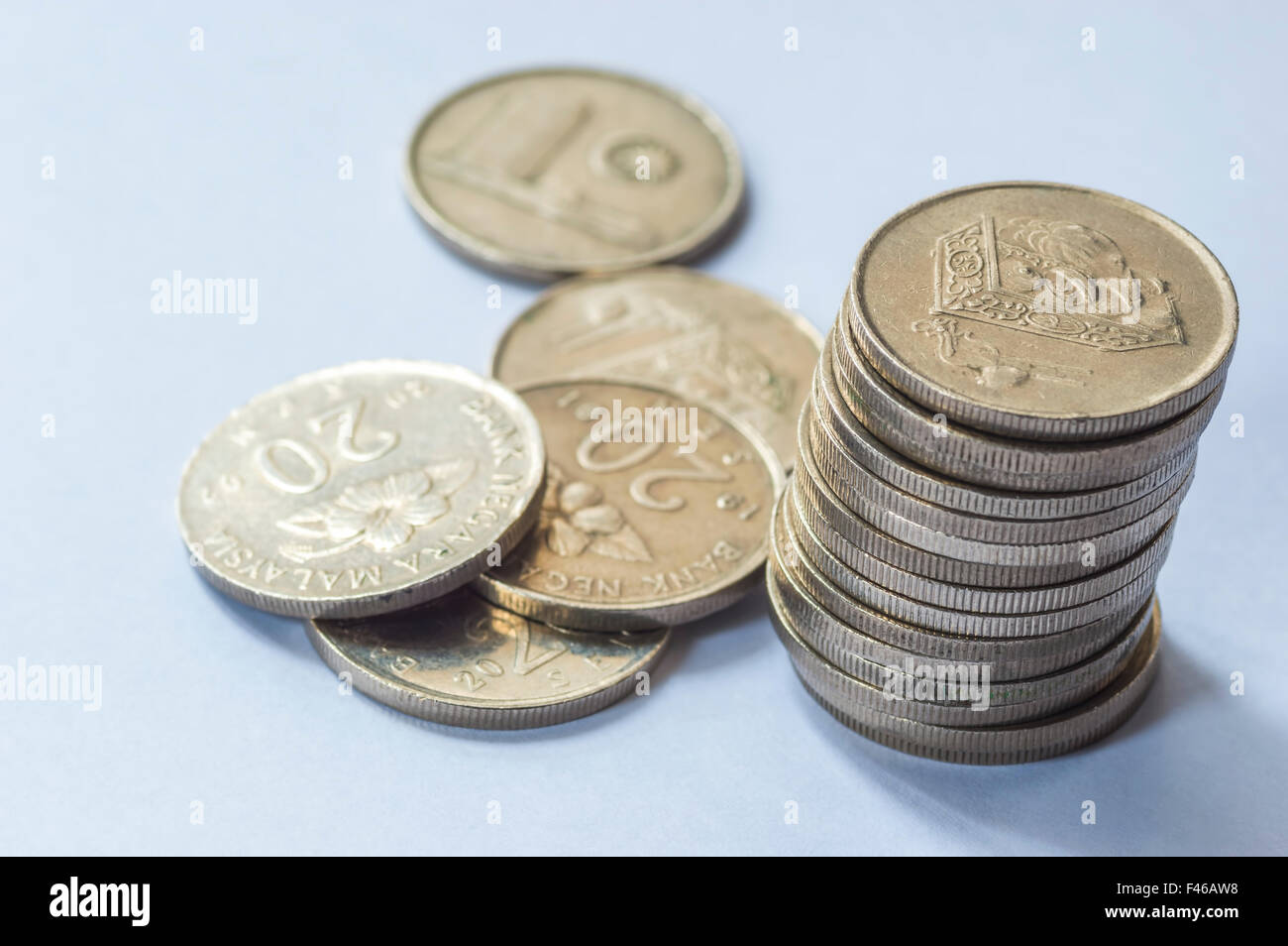 coin stack on white background Stock Photo - Alamy