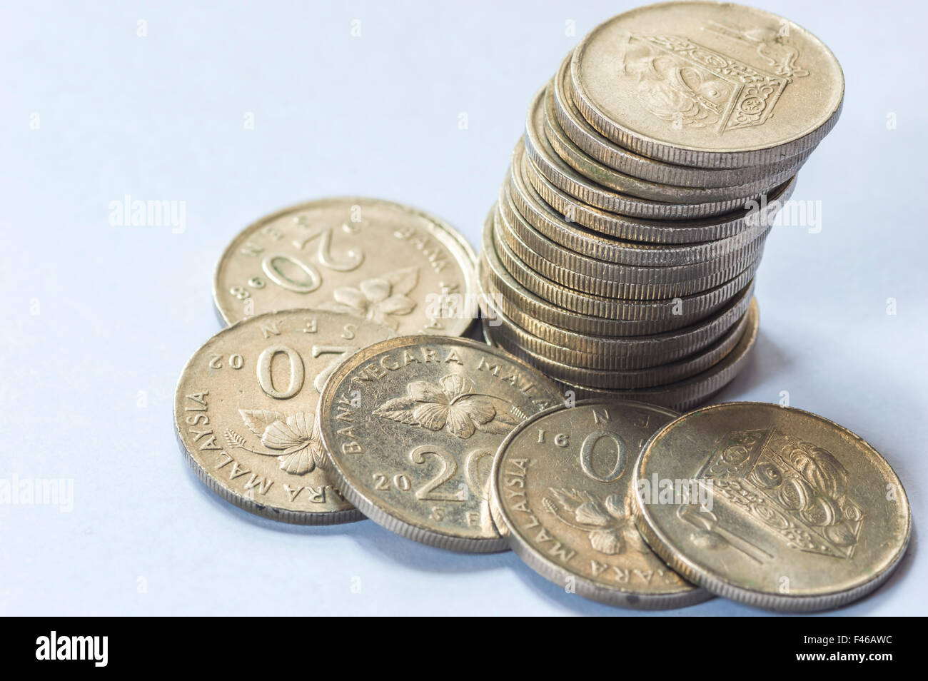 coin stack on white background Stock Photo - Alamy