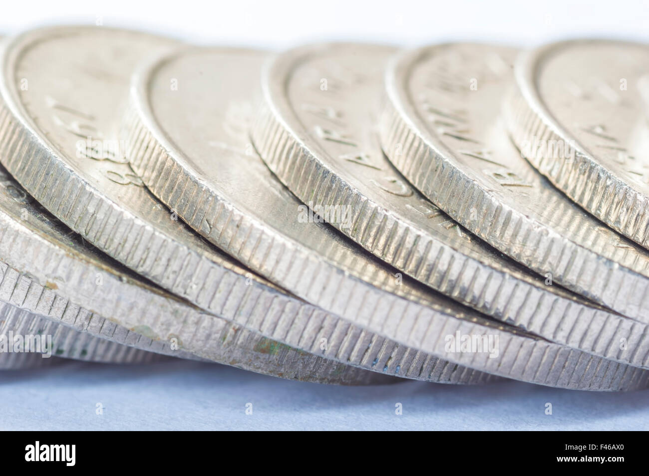 coin stack on white background Stock Photo - Alamy