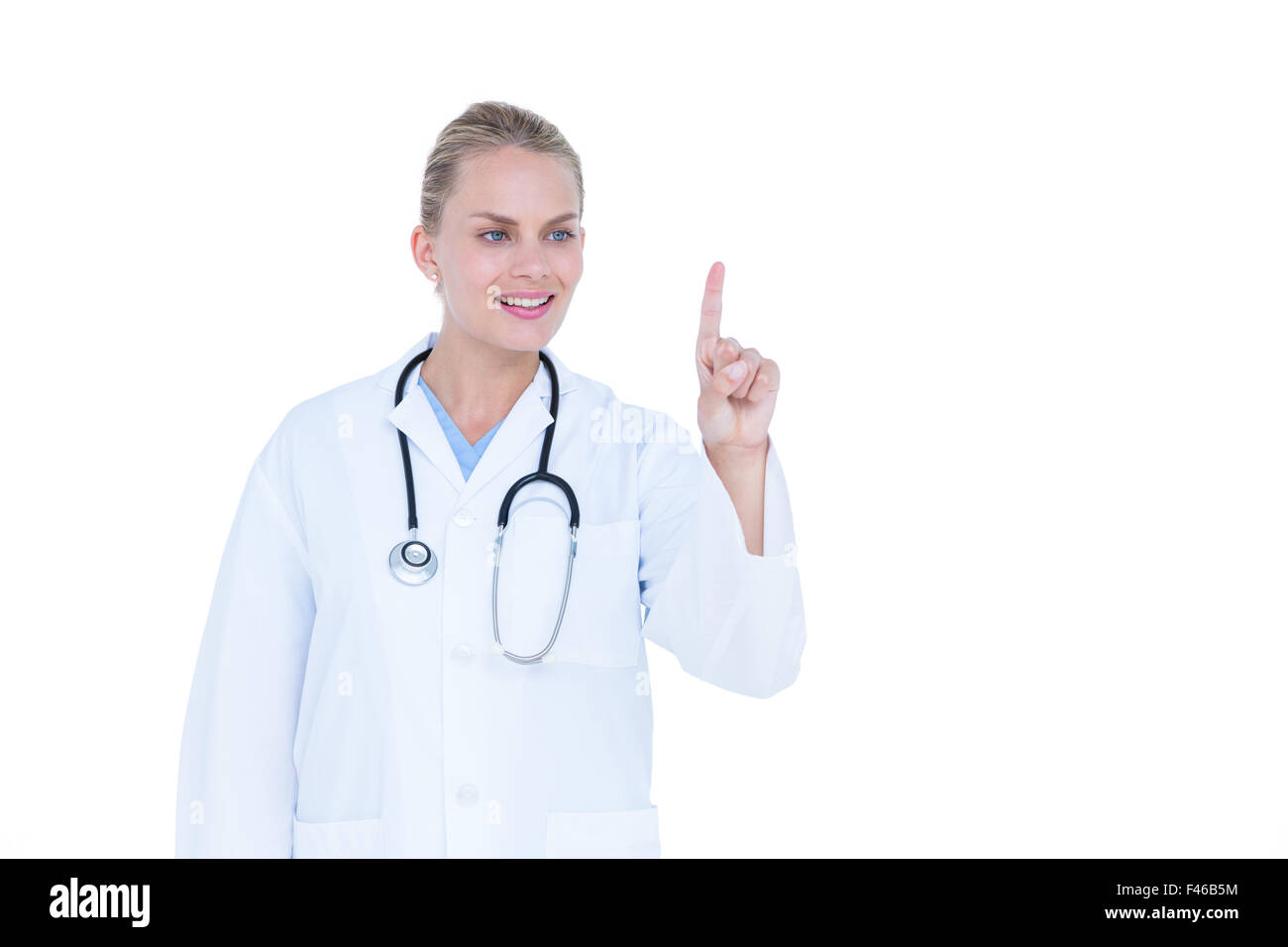 Doctor standing with finger up Stock Photo - Alamy
