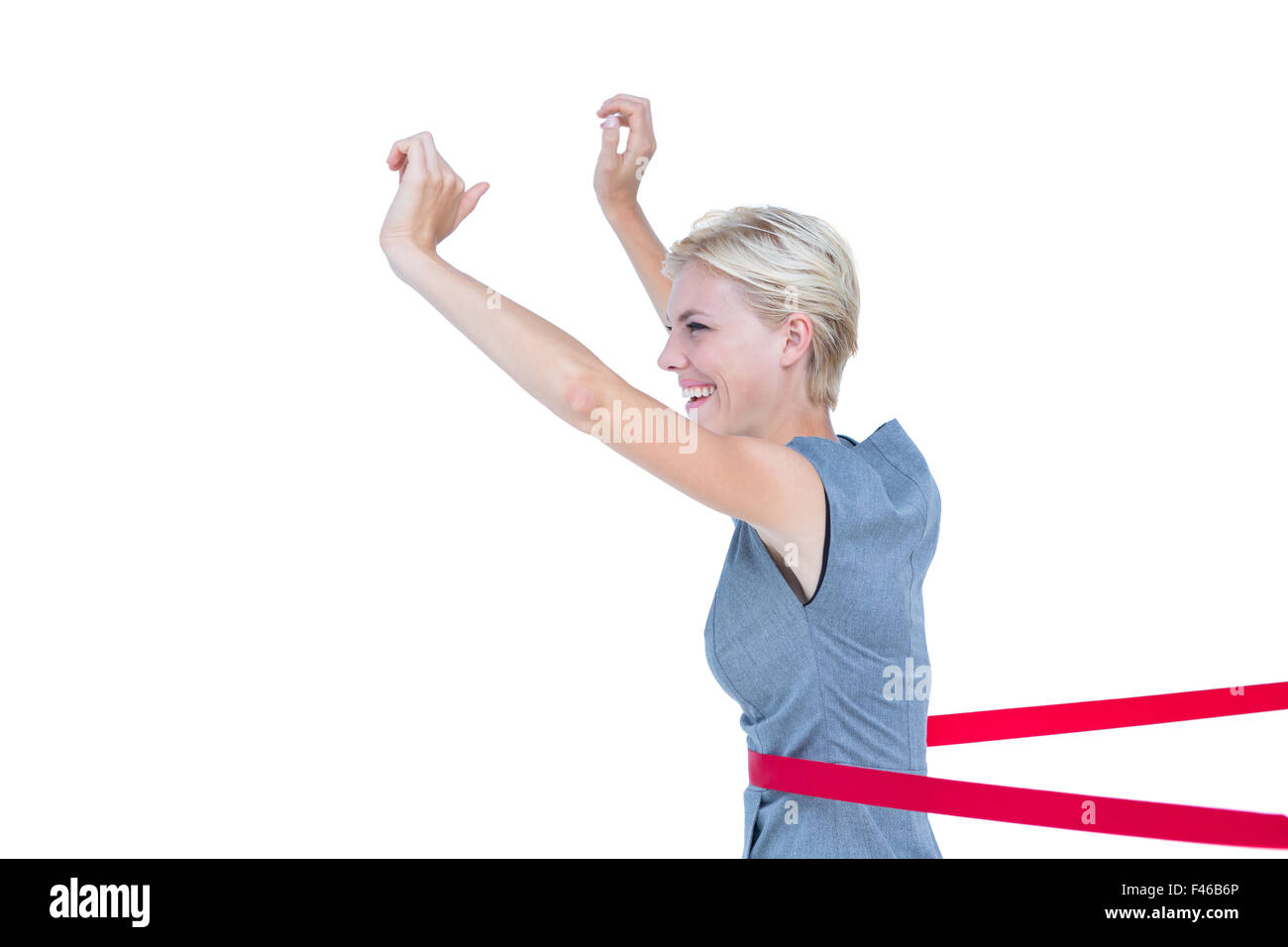 Happy business team cutting red ribbon Stock Photo - Alamy
