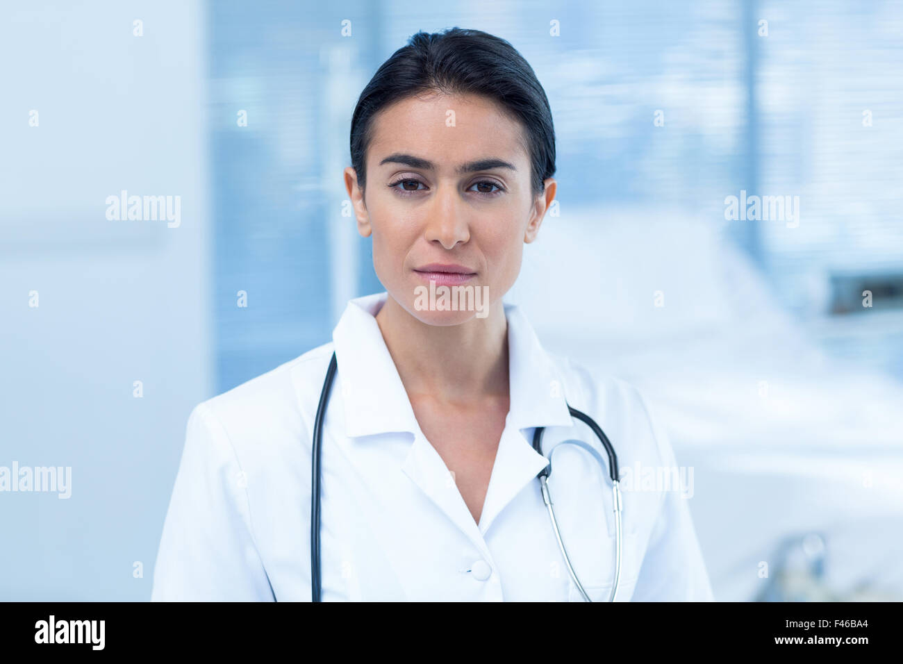 Serious female doctor looking camera hi-res stock photography and ...