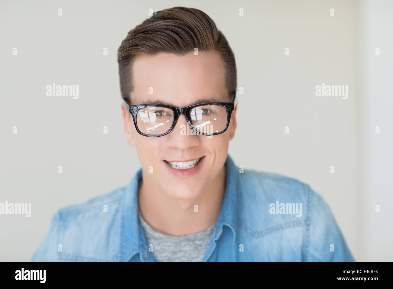 Happy handsome man looking at camera Stock Photo - Alamy