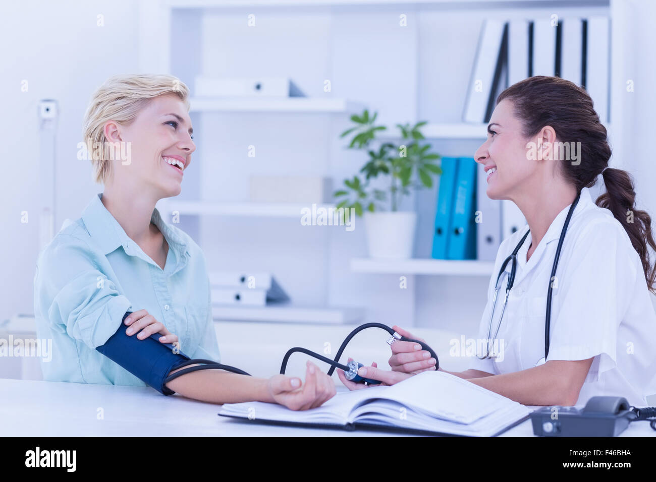 Doctors speaking together Stock Photo - Alamy