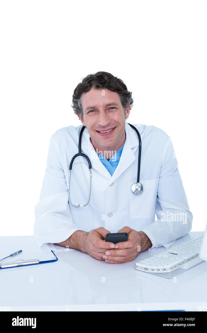 Doctor smiling at the camera Stock Photo - Alamy