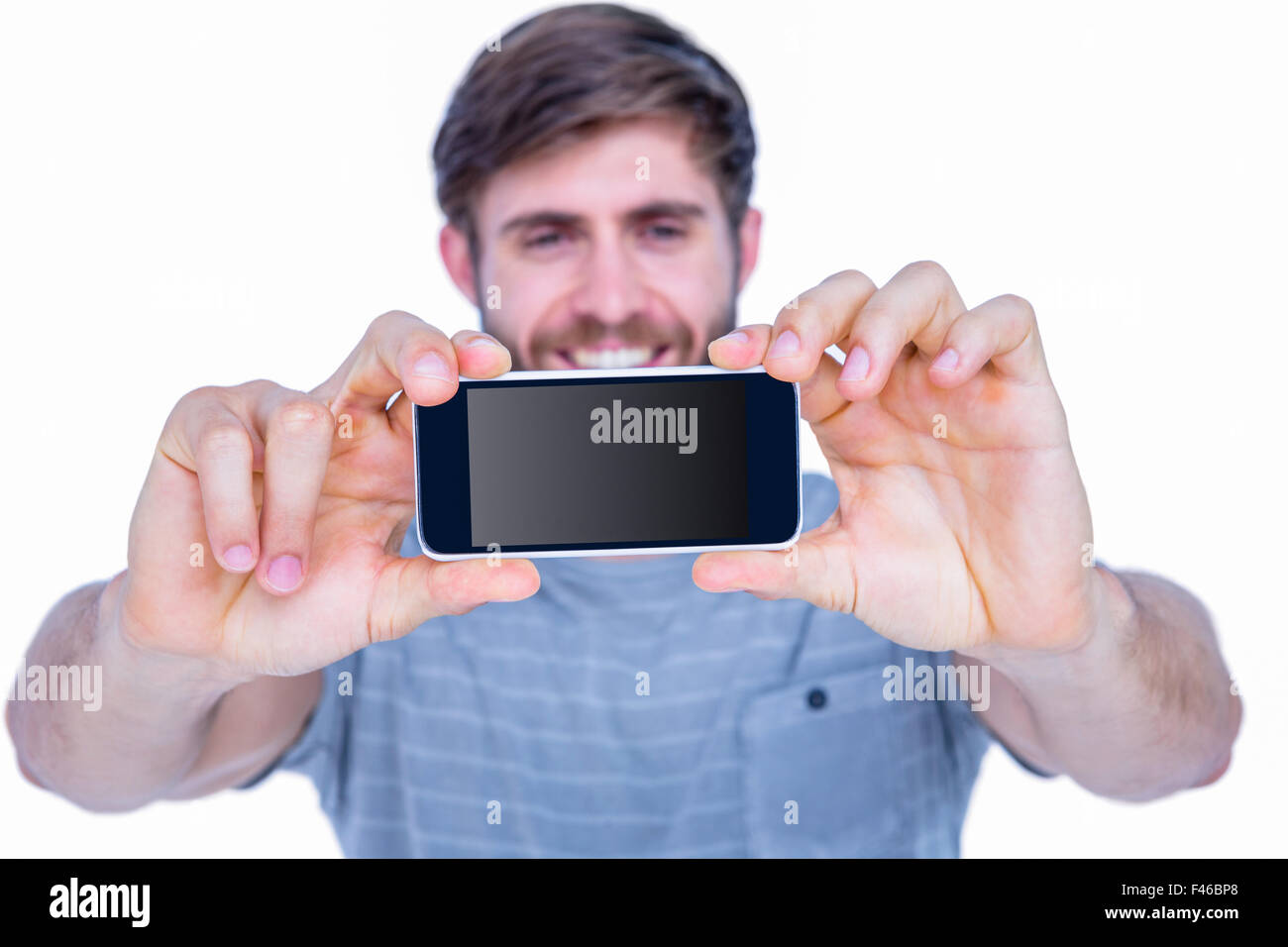 Happy handsome man taking a selfie Stock Photo - Alamy