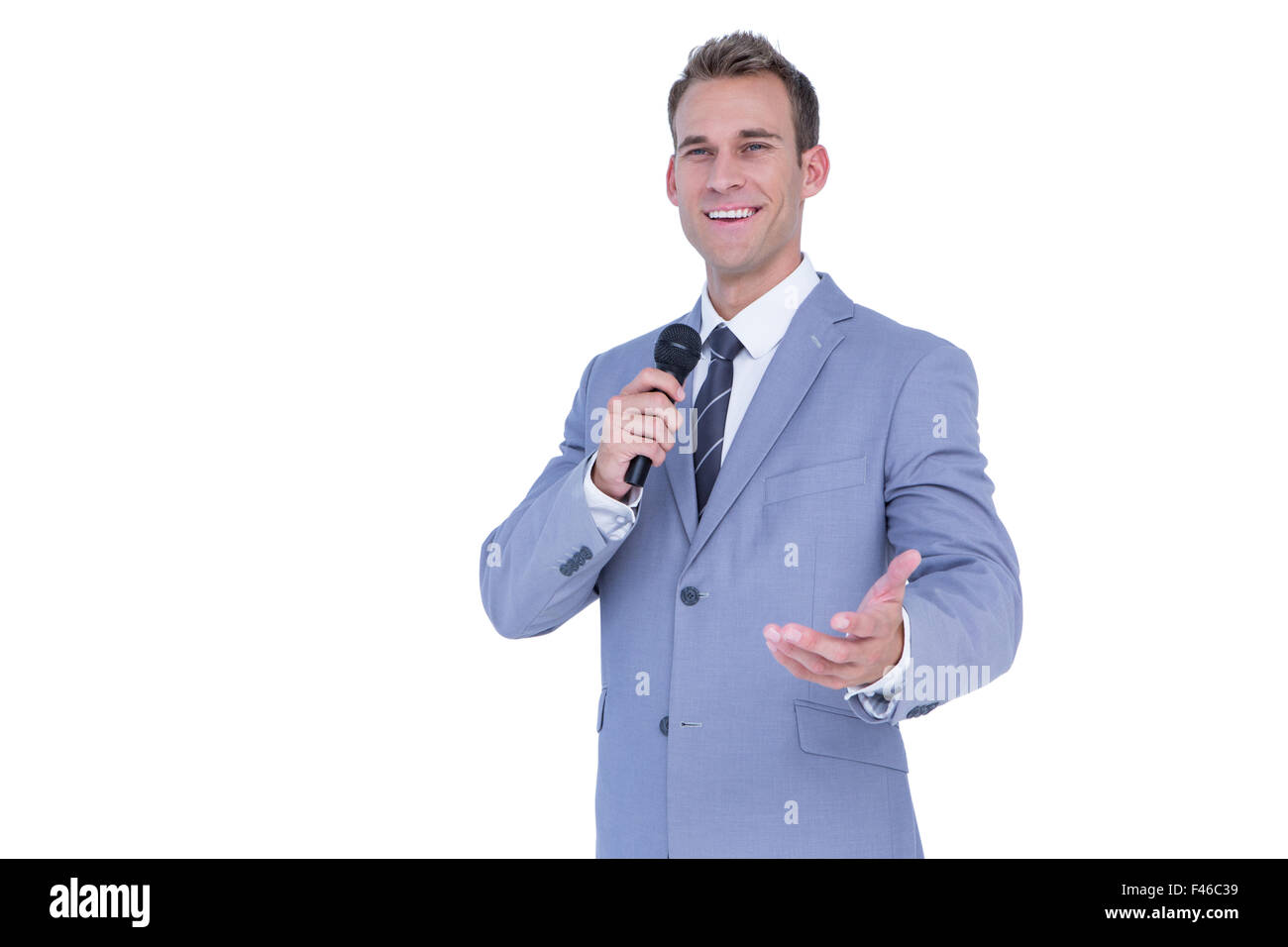 Happy businessman speaking with micro Stock Photo - Alamy