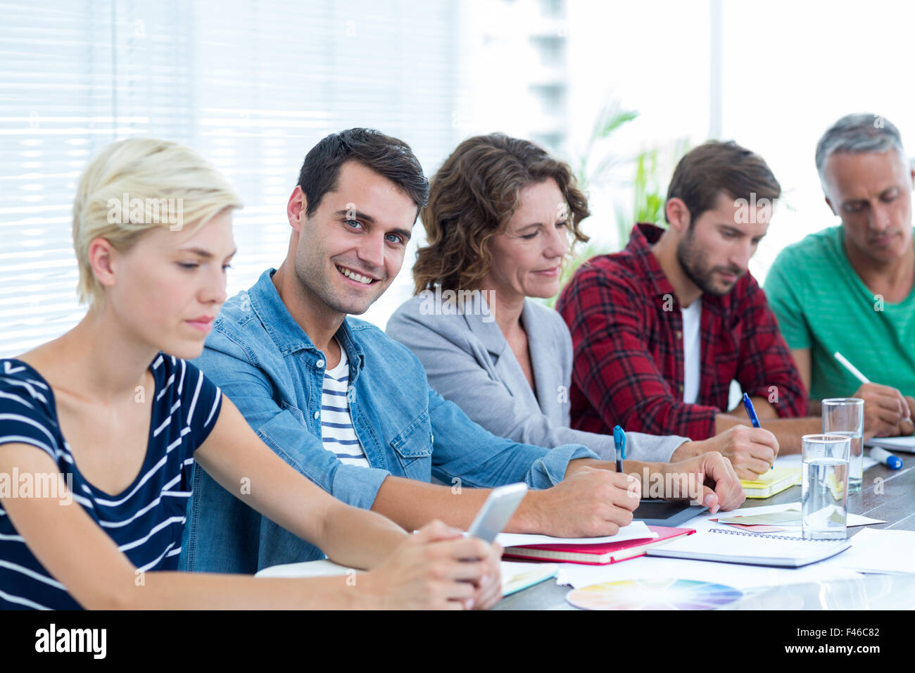Creative business people in meeting Stock Photo - Alamy