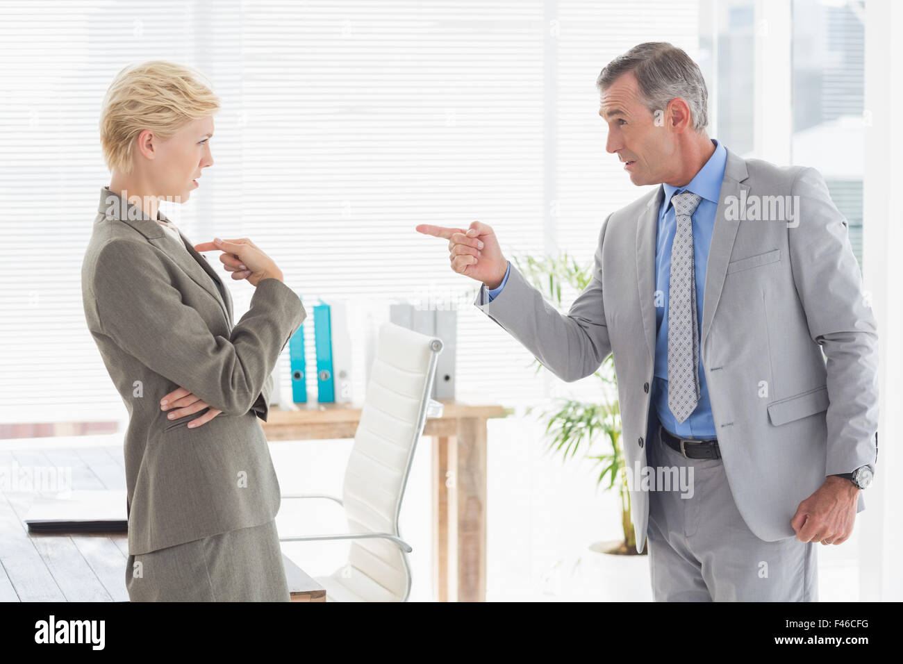 Boss yelling at colleague Stock Photo - Alamy