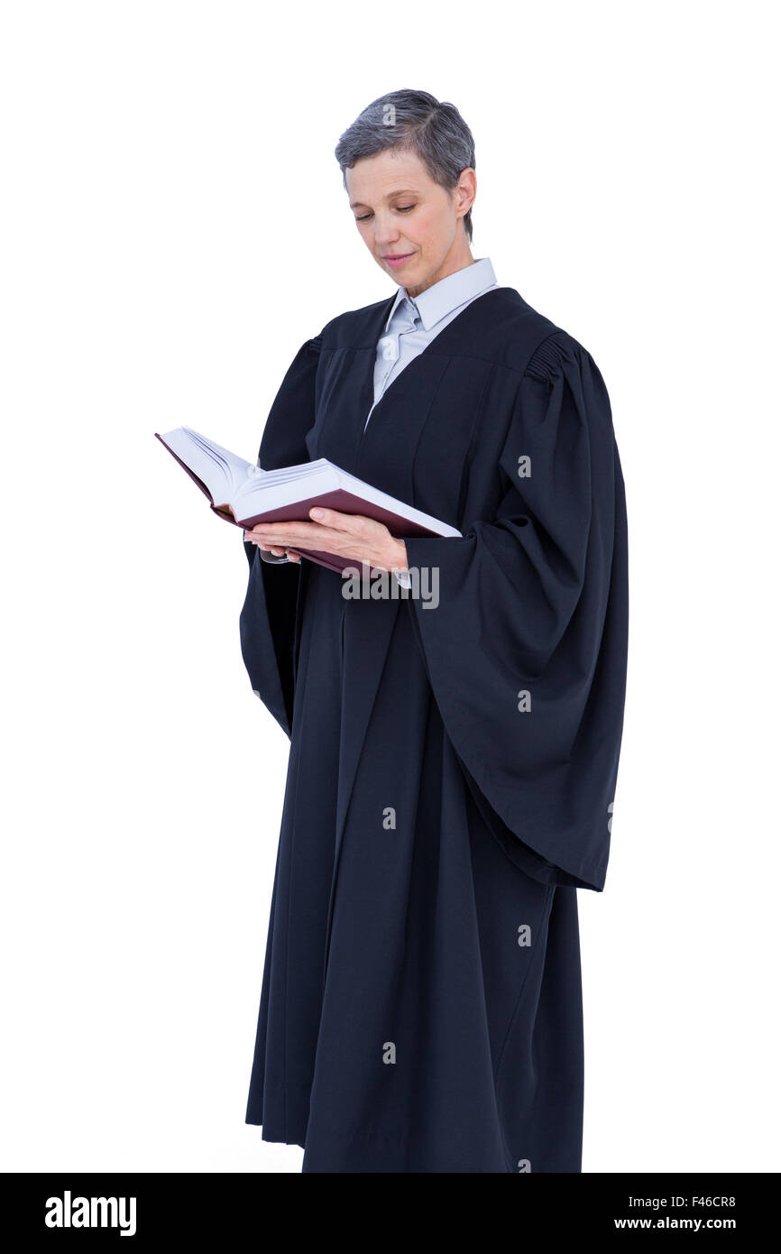 Serious lawyer reading law code Stock Photo - Alamy