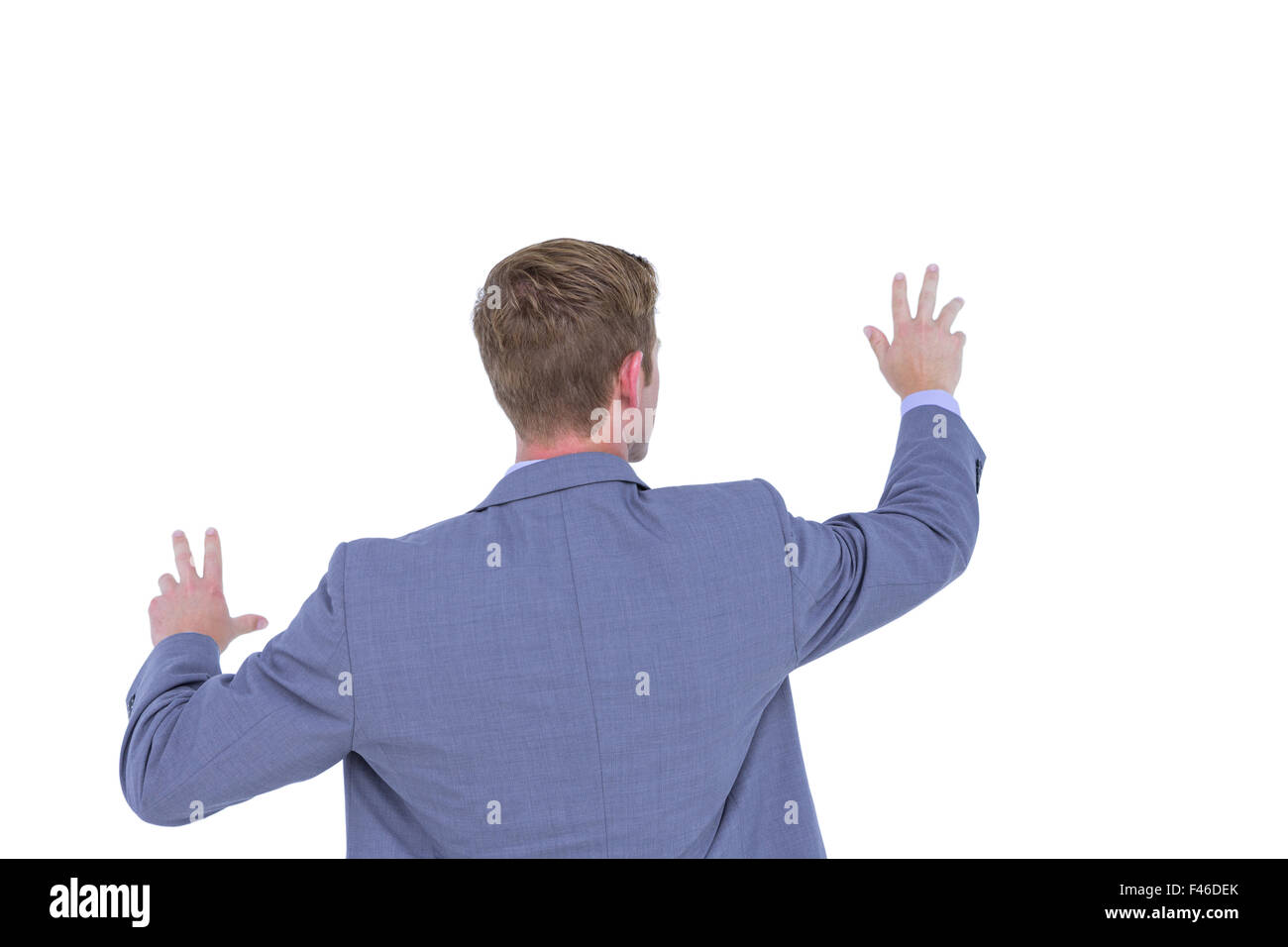 Back turned businessman gesturing with hands Stock Photo - Alamy