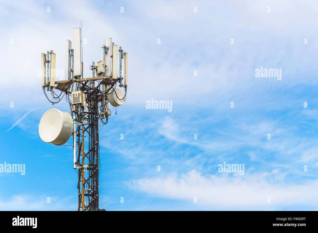 Tv antenna with blue skies Stock Photo - Alamy
