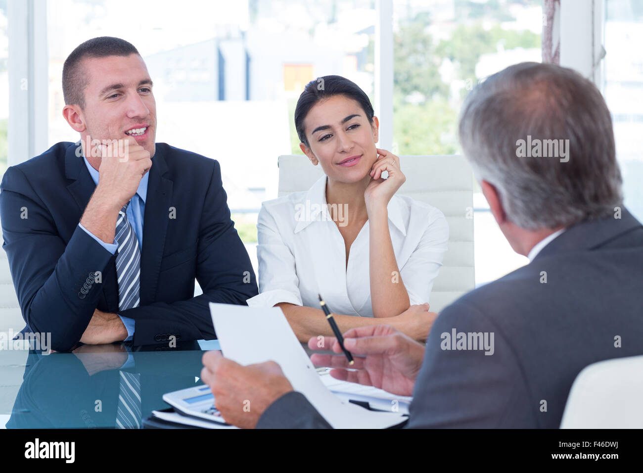 Business people in discussion in an office Stock Photo - Alamy