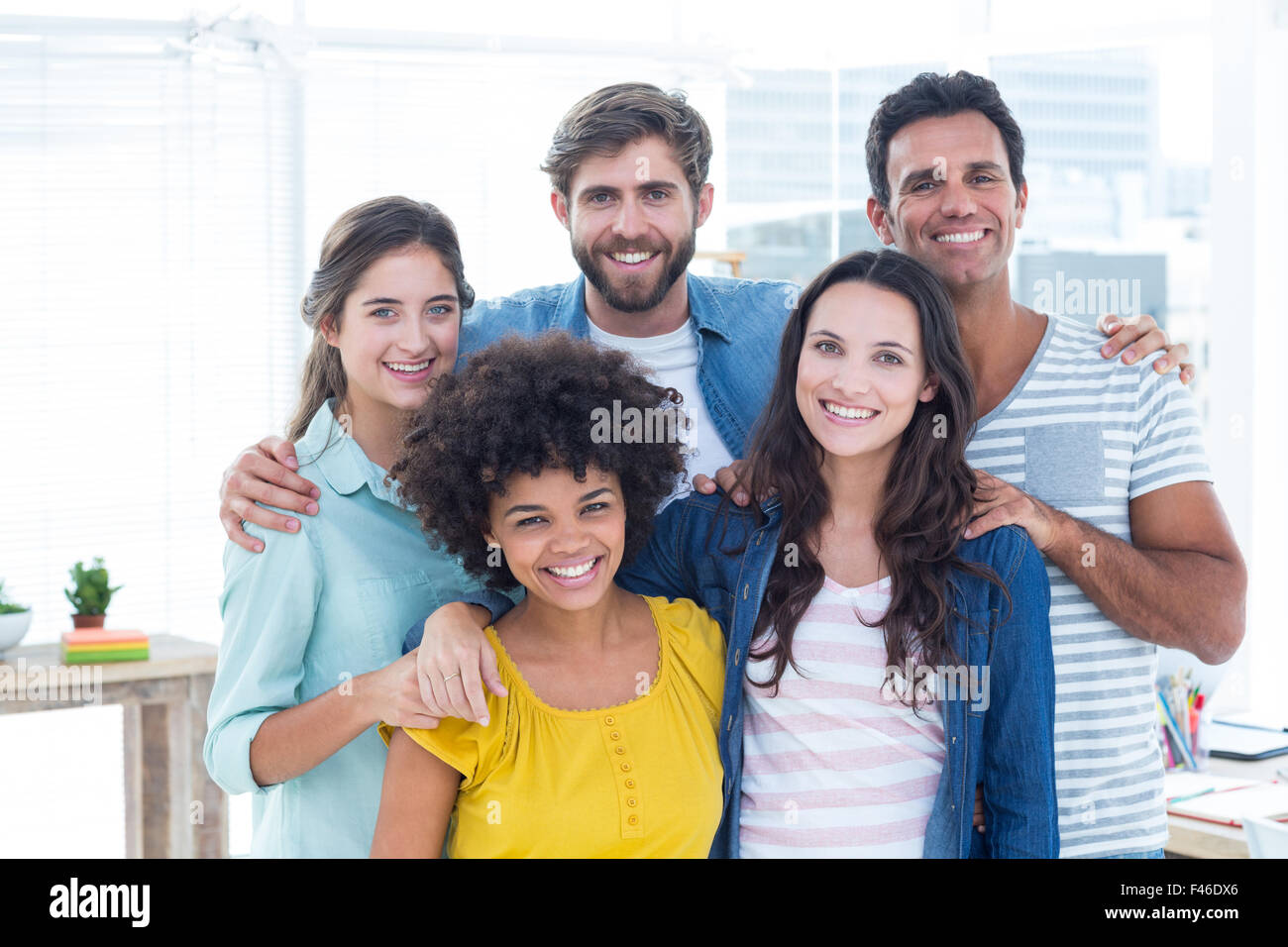 Group portrait of happy young colleagues Stock Photo - Alamy