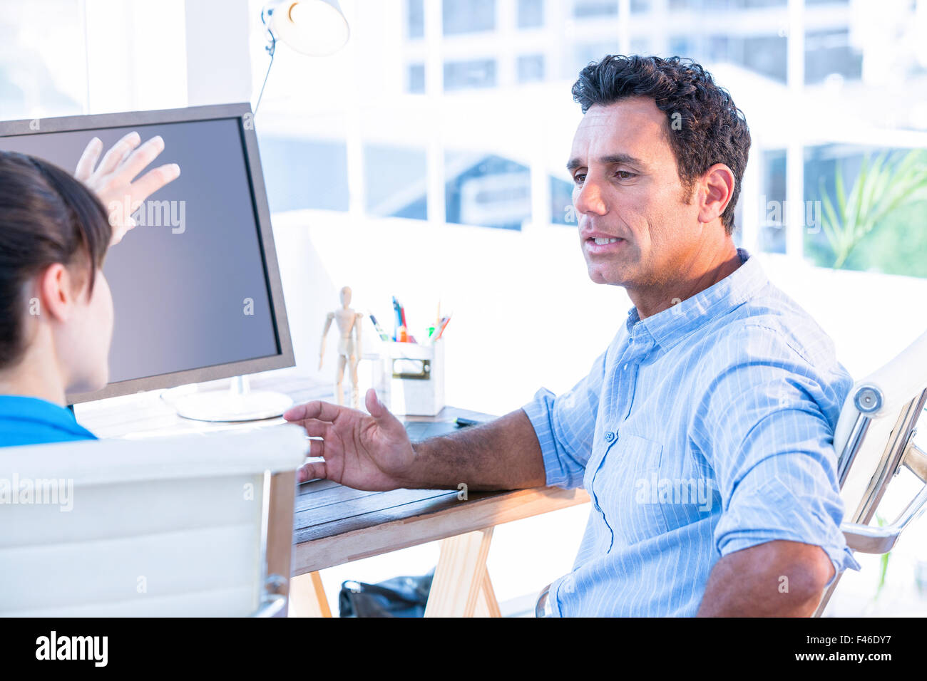 Creative business partners working together Stock Photo - Alamy