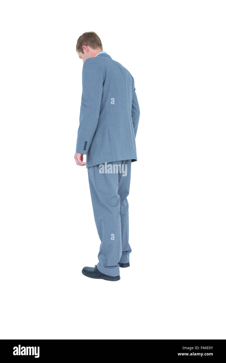 Businessman standing down Stock Photo - Alamy