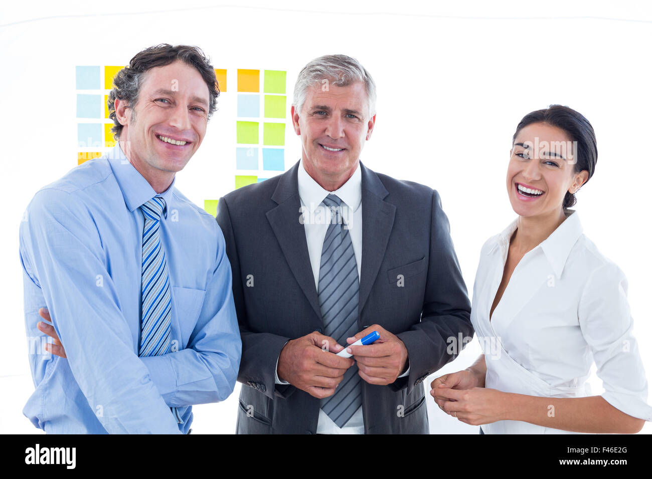 Stylish business people smiling discussing hi-res stock photography and ...