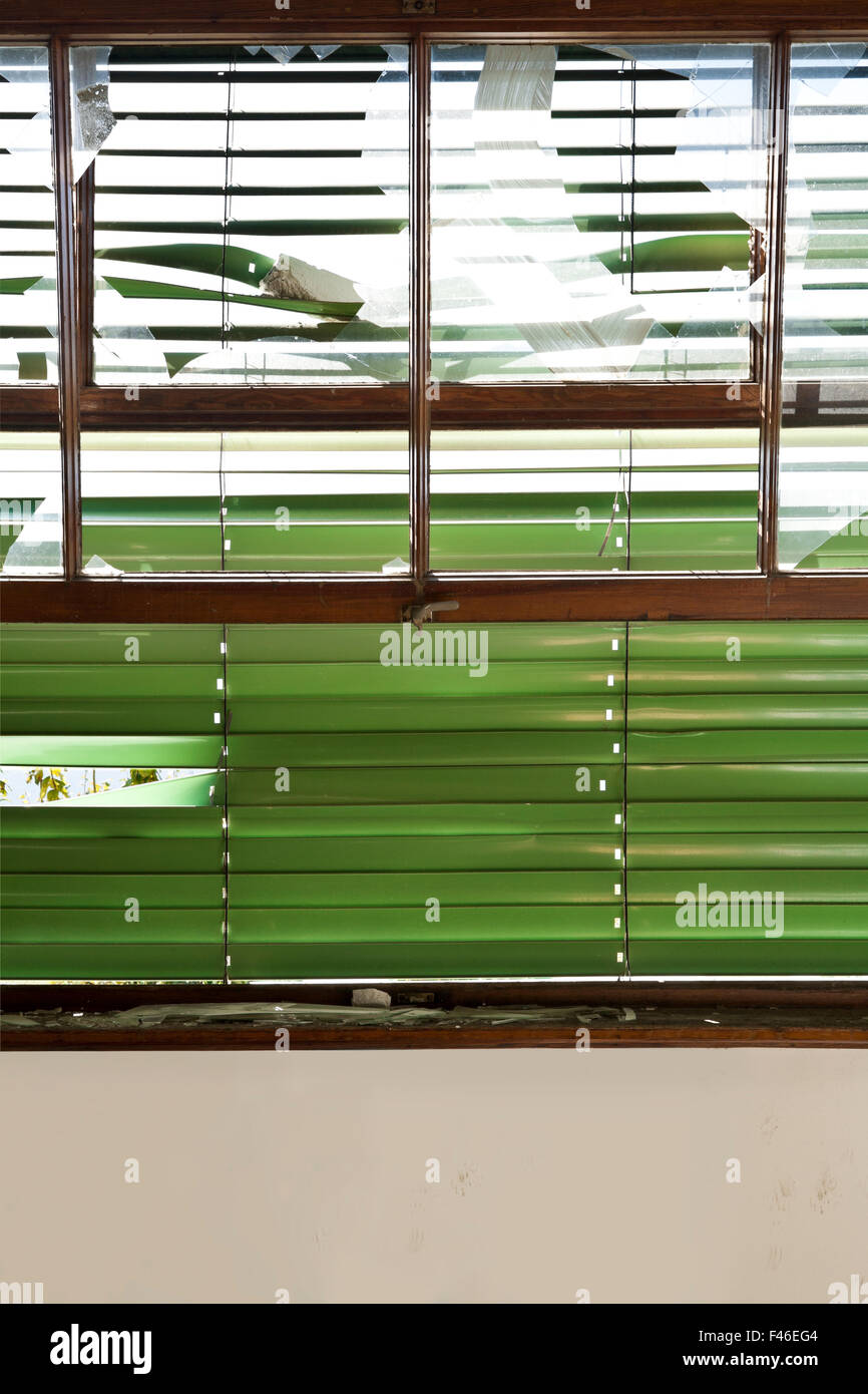 old abandoned house, window, roller shutter broken Stock Photo - Alamy