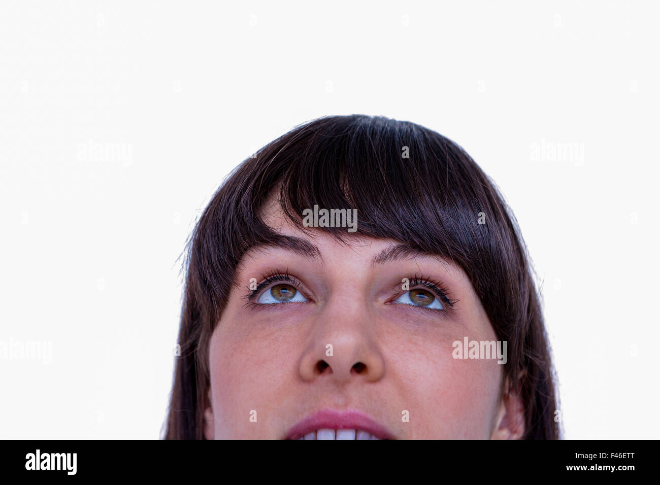 Close up of woman looking up Stock Photo - Alamy