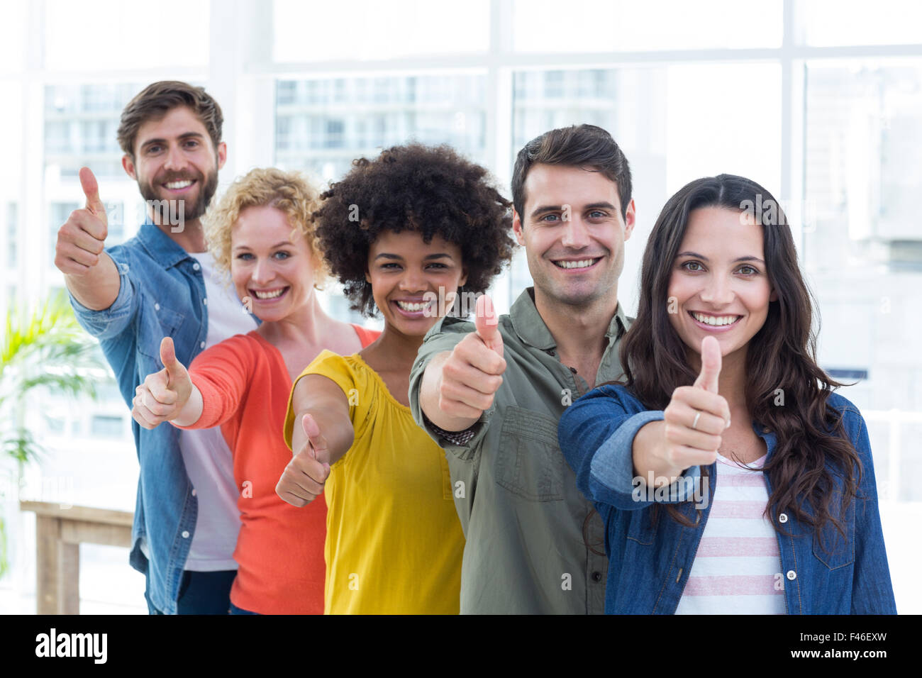 Group portrait of happy young colleagues Stock Photo - Alamy