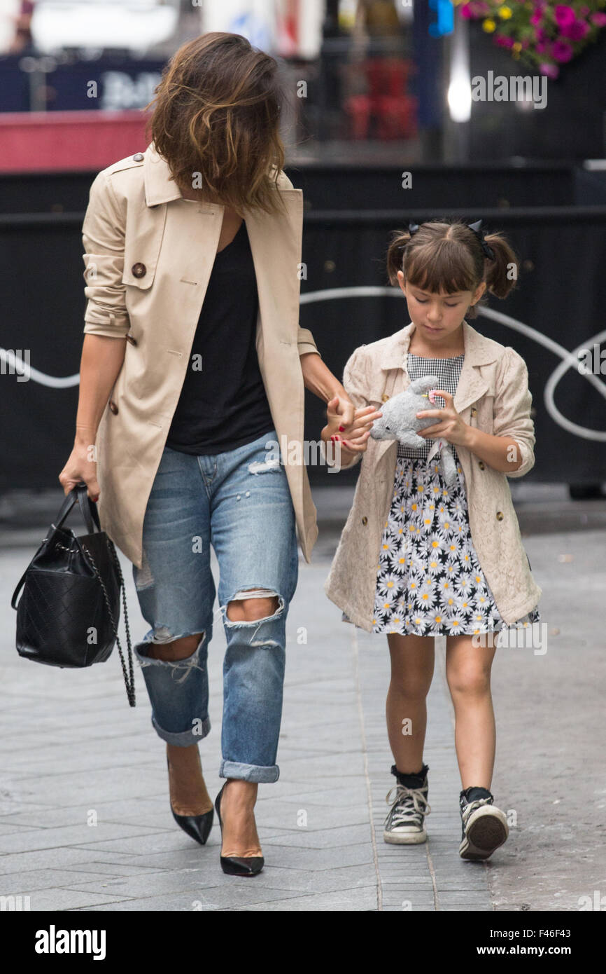 Myleene Klass arriving at the Capital Radio studios with her daughter ...