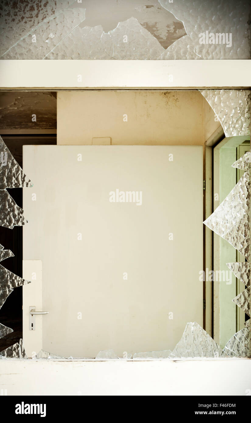 abandoned building, window with broken glass Stock Photo - Alamy