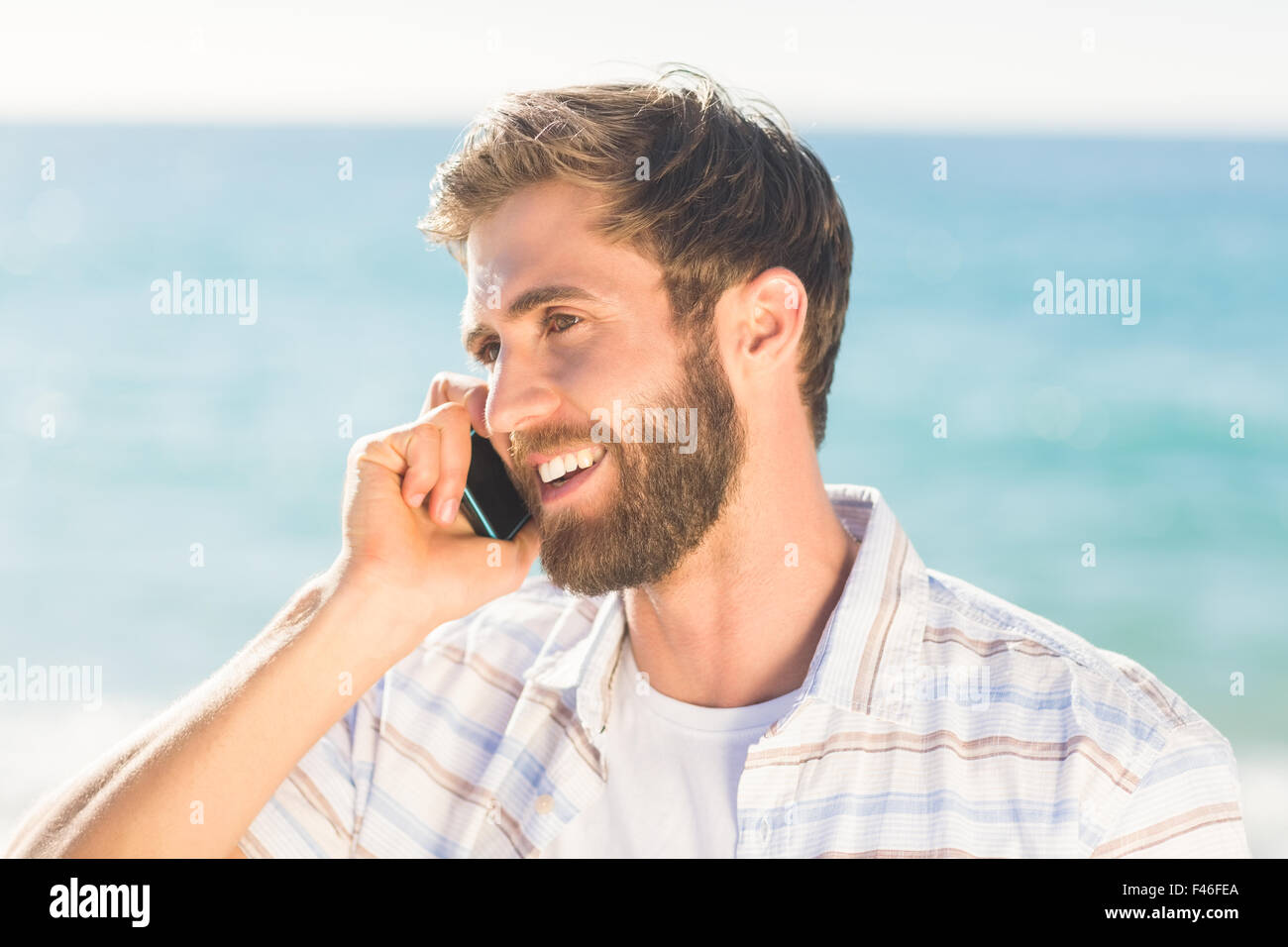 man using his phone Stock Photo - Alamy