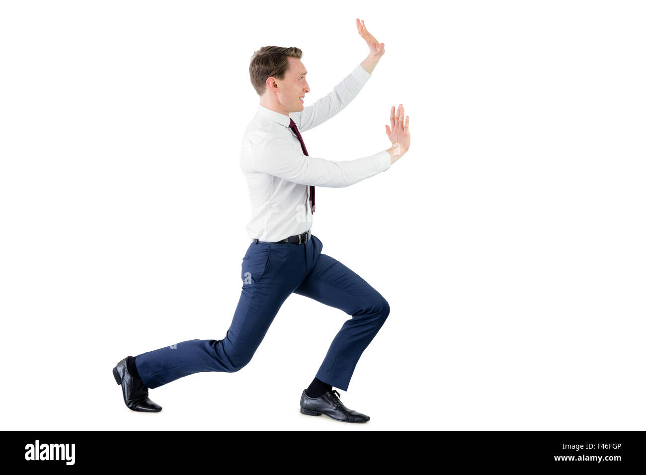 Business man pushing something hi-res stock photography and images - Alamy