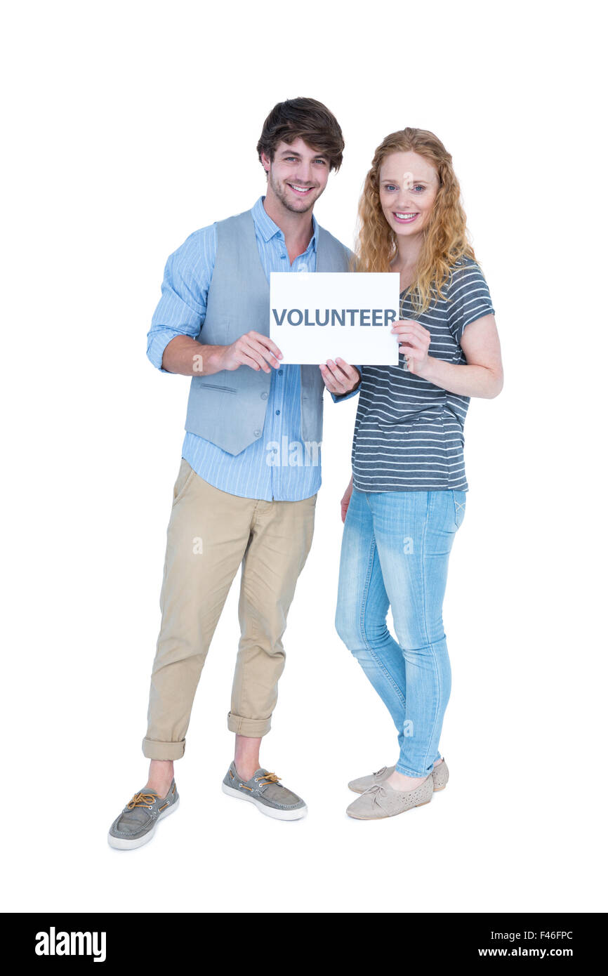 Young volunteer man holding Cut Out Stock Images & Pictures - Alamy