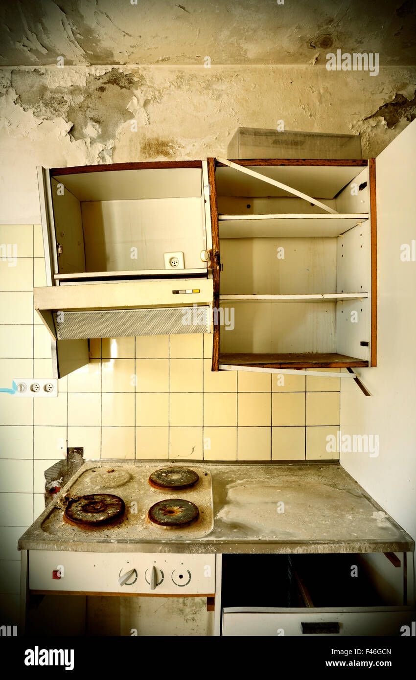 old kitchen destroyed, interior abandoned house Stock Photo - Alamy