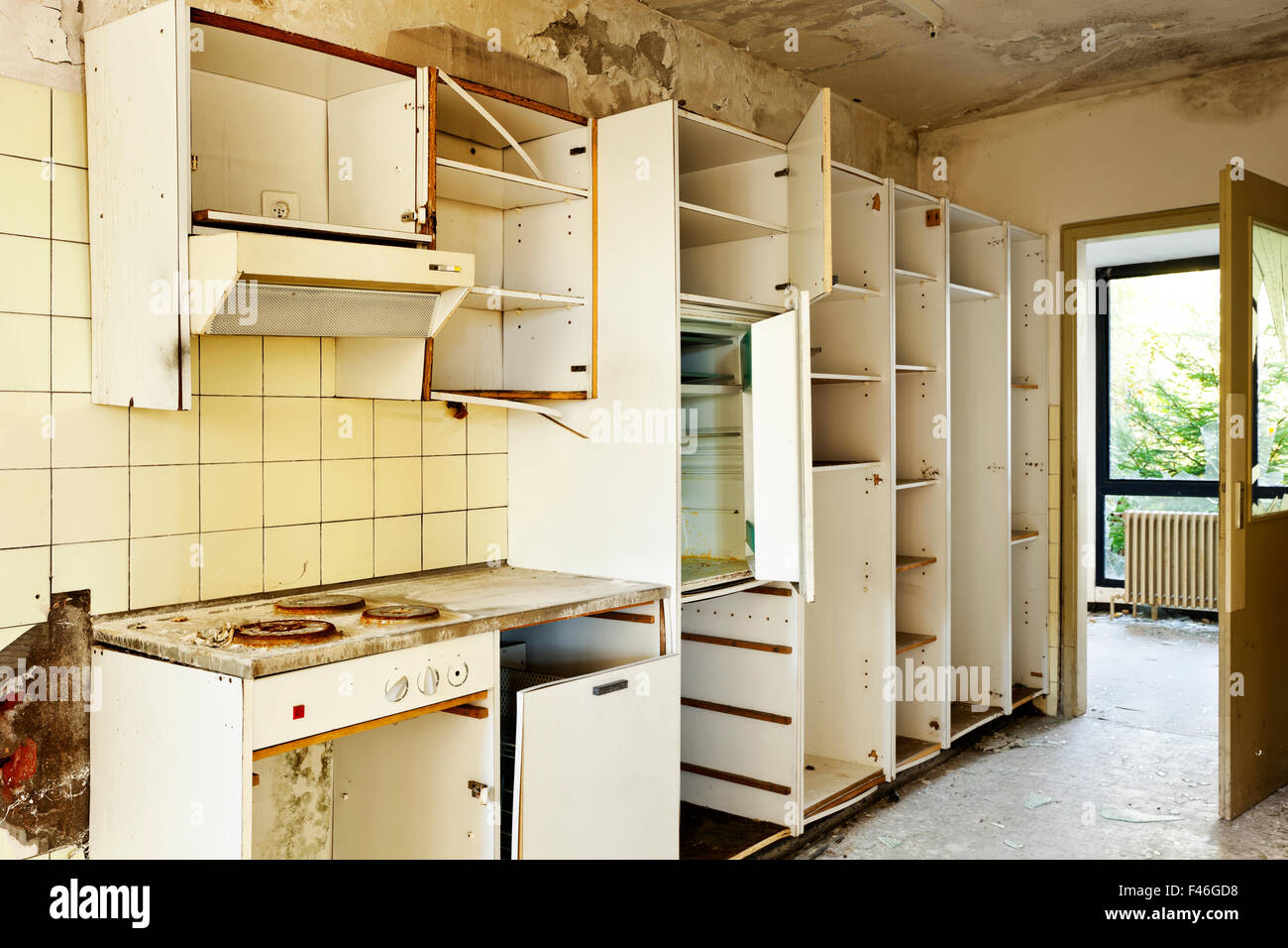 old kitchen destroyed, interior abandoned house Stock Photo - Alamy