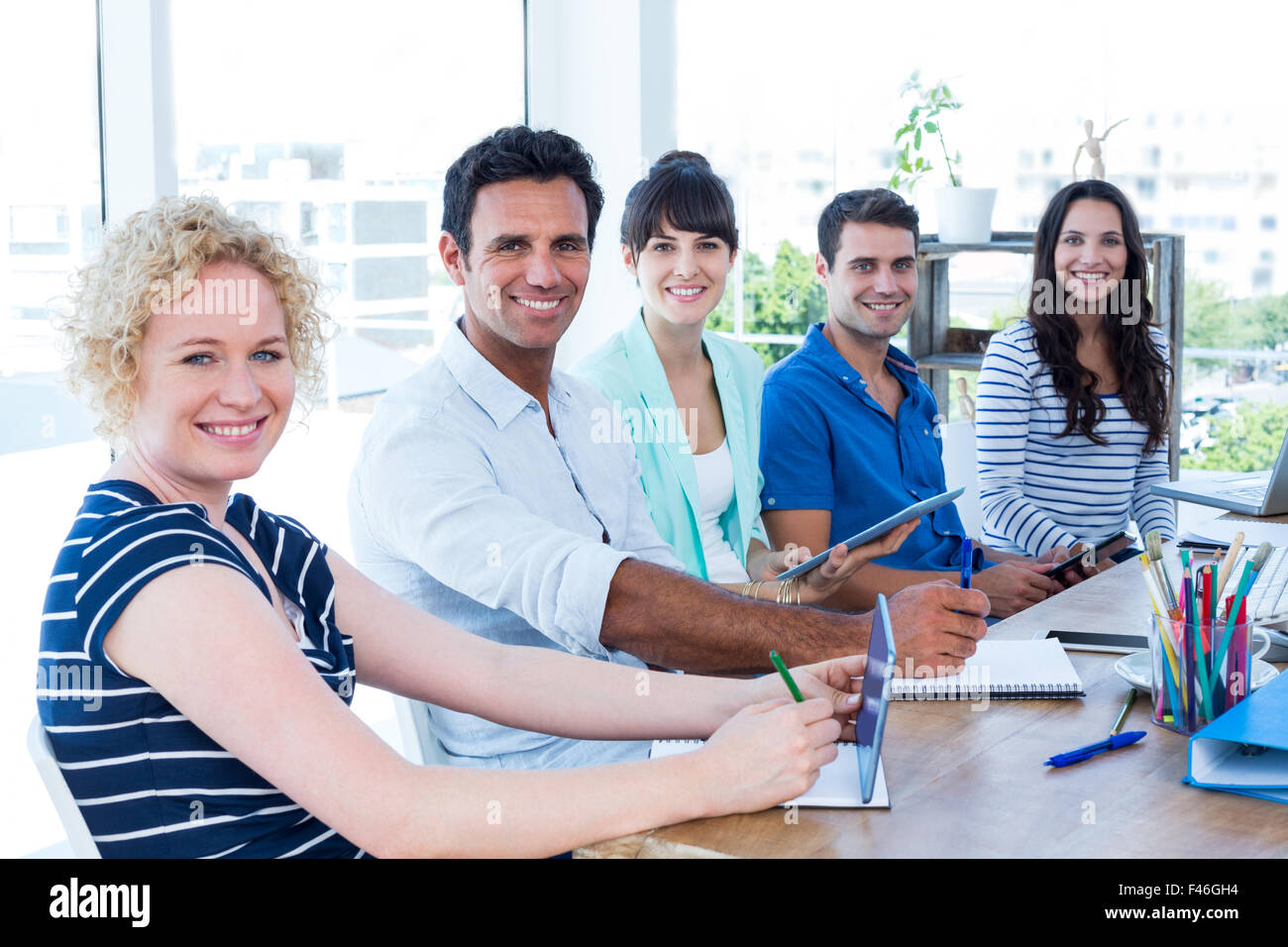 Creative business team in meeting Stock Photo - Alamy