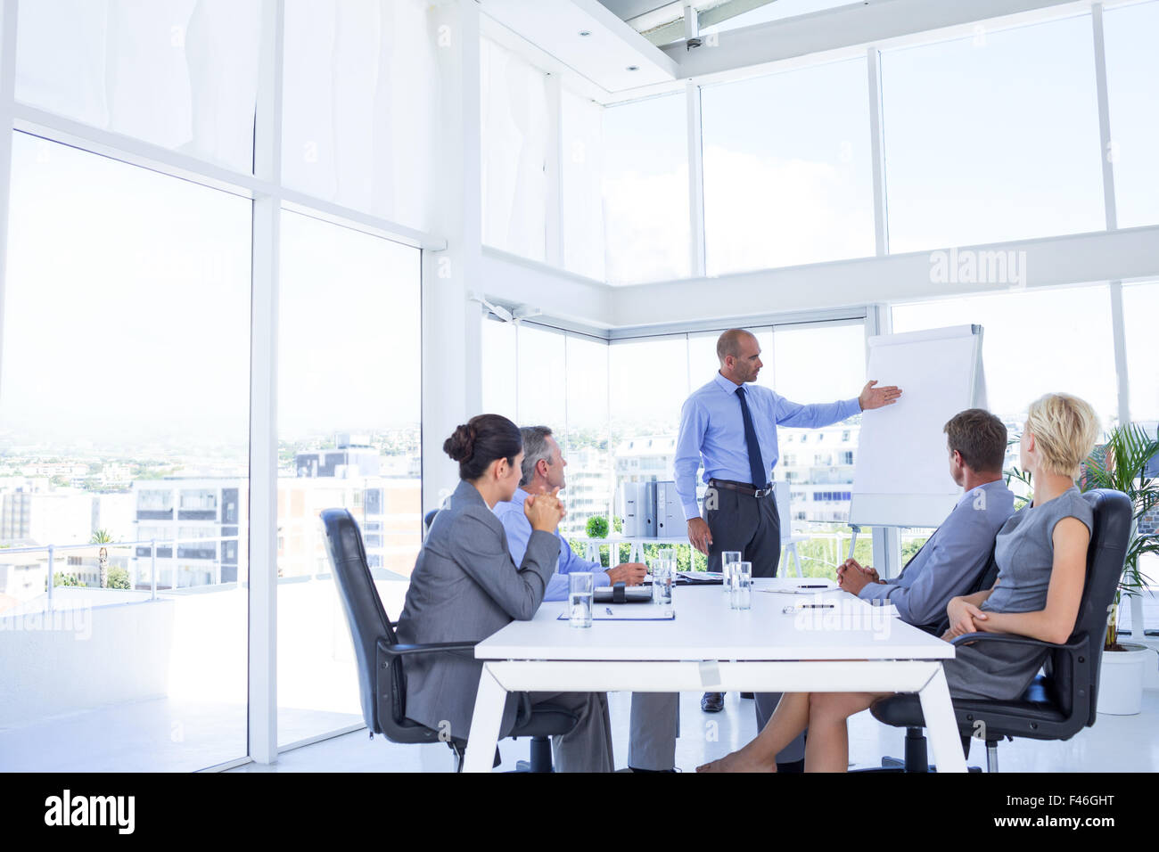Business people listening during meeting Stock Photo - Alamy